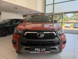Orange Toyota Hilux 2023 in Riga, with an engine capacity of 2.80 L and mileage of 81 thousand km for 40900 €, photo 3 on AUTOMOTO.COM.LV