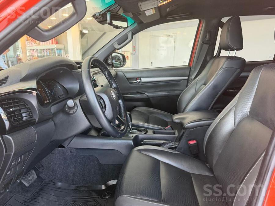 Orange Toyota Hilux 2023 in Riga, with an engine capacity of 2.80 L and mileage of 81 thousand km for 40900 €, photo 12 on AUTOMOTO.COM.LV