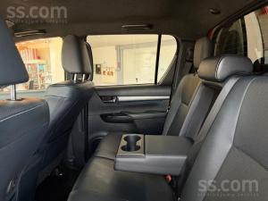 Orange Toyota Hilux 2023 in Riga, with an engine capacity of 2.80 L and mileage of 81 thousand km for 40900 €, photo 16 on AUTOMOTO.COM.LV