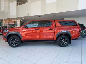 Orange Toyota Hilux 2023 in Riga, with an engine capacity of 2.80 L and mileage of 81 thousand km for 40900 €, photo 19 on AUTOMOTO.COM.LV