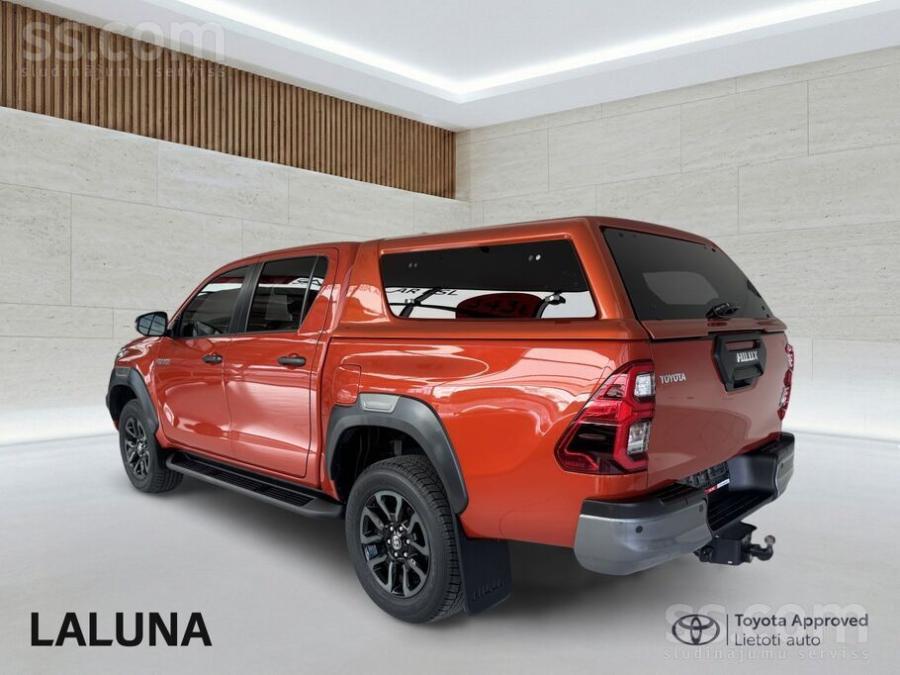 Orange Toyota Hilux 2023 in Jekabpils, with an engine capacity of 2.80 L and mileage of 81 thousand km for 40900 €, photo 7 on AUTOMOTO.COM.LV