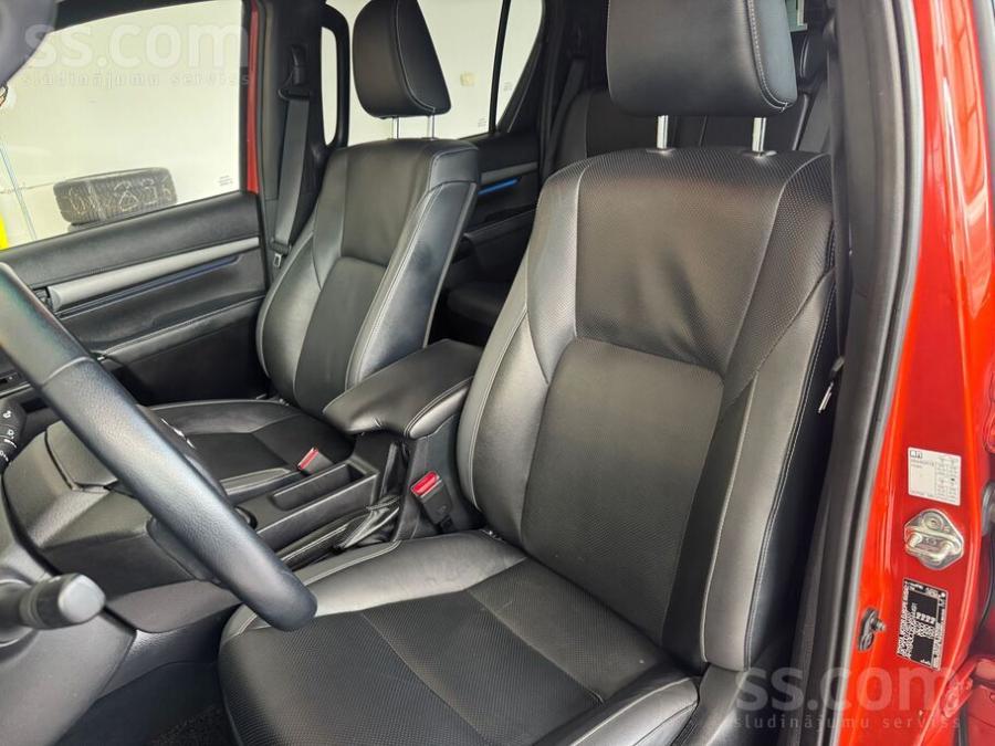 Orange Toyota Hilux 2023 in Jekabpils, with an engine capacity of 2.80 L and mileage of 81 thousand km for 40900 €, photo 8 on AUTOMOTO.COM.LV