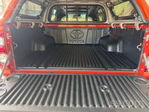 Orange Toyota Hilux 2023 in Jekabpils, with an engine capacity of 2.80 L and mileage of 81 thousand km for 40900 €, photo 32 on AUTOMOTO.COM.LV