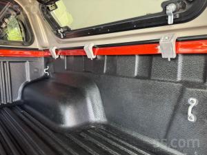 Orange Toyota Hilux 2023 in Jekabpils, with an engine capacity of 2.80 L and mileage of 81 thousand km for 40900 €, photo 34 on AUTOMOTO.COM.LV