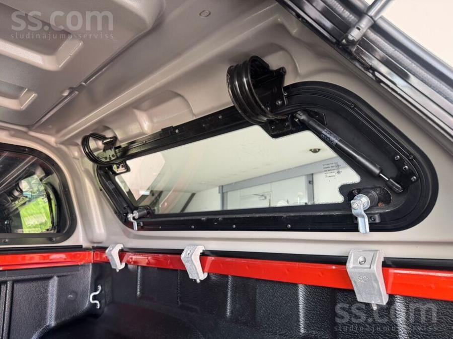 Orange Toyota Hilux 2023 in Jekabpils, with an engine capacity of 2.80 L and mileage of 81 thousand km for 40900 €, photo 35 on AUTOMOTO.COM.LV