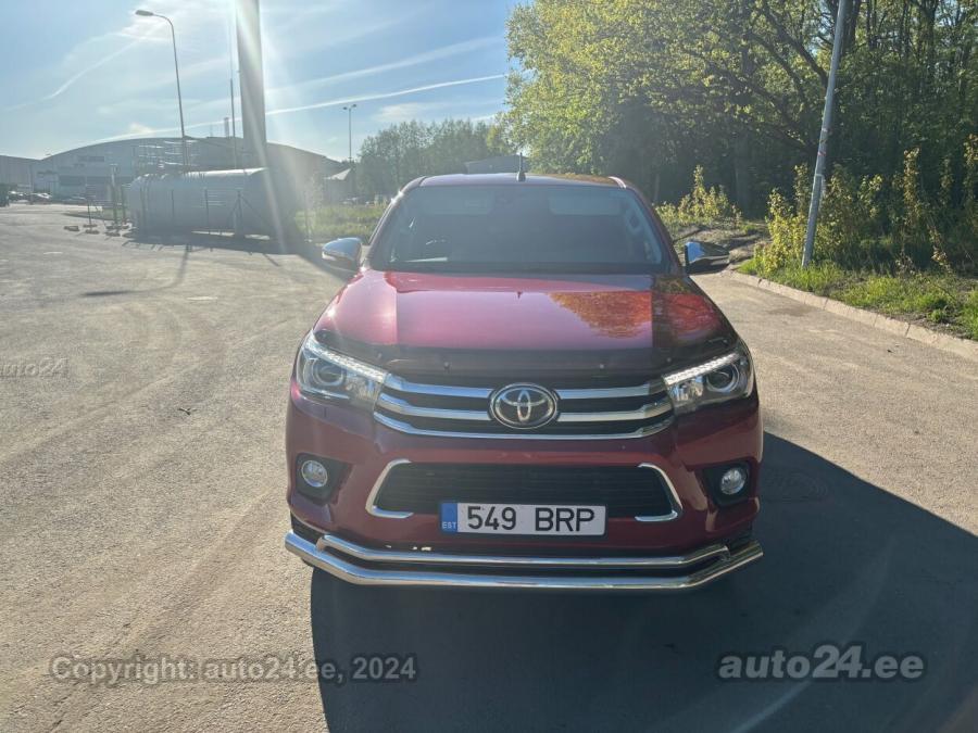 Red Toyota Hilux 0 in Tallinn, with an engine capacity of 2.40 L and mileage of 230 thousand km for 33000 €, photo 2 on AUTOMOTO.COM.LV