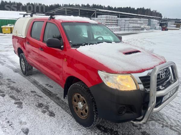 Red Toyota Hilux 2011 in Riga, with an engine capacity of 2.50 L and mileage of 225 thousand km for 9500 €, photo 2 on AUTOMOTO.COM.LV
