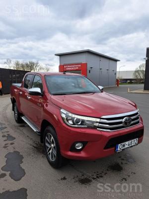 Sarkans Toyota Hilux 2019 Ogre, ar dzinēja tilpumu 2.40 L un nobraukumu 159 tūkst. km par 22999 €, foto  vietnē AUTOMOTO.COM.LV