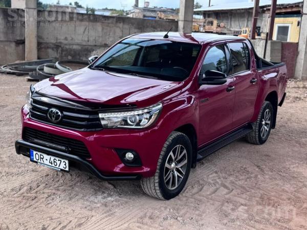 Red Toyota Hilux 2020 in Valmiera, with an engine capacity of 2.40 L and mileage of 221 thousand km for 25800 €, photo 1 on AUTOMOTO.COM.LV