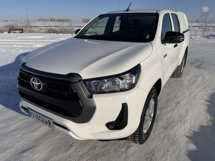 White Toyota Hilux 2022 in Radviliskis, with an engine capacity of 2.40 L and mileage of 55 thousand km for 26150 €, photo 6 on AUTOMOTO.COM.LV