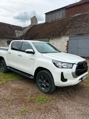 White Toyota Hilux 2024 in Tallinn, with an engine capacity of 2.40 L and mileage of 60 thousand km for 44800 €, photo 3 on AUTOMOTO.COM.LV