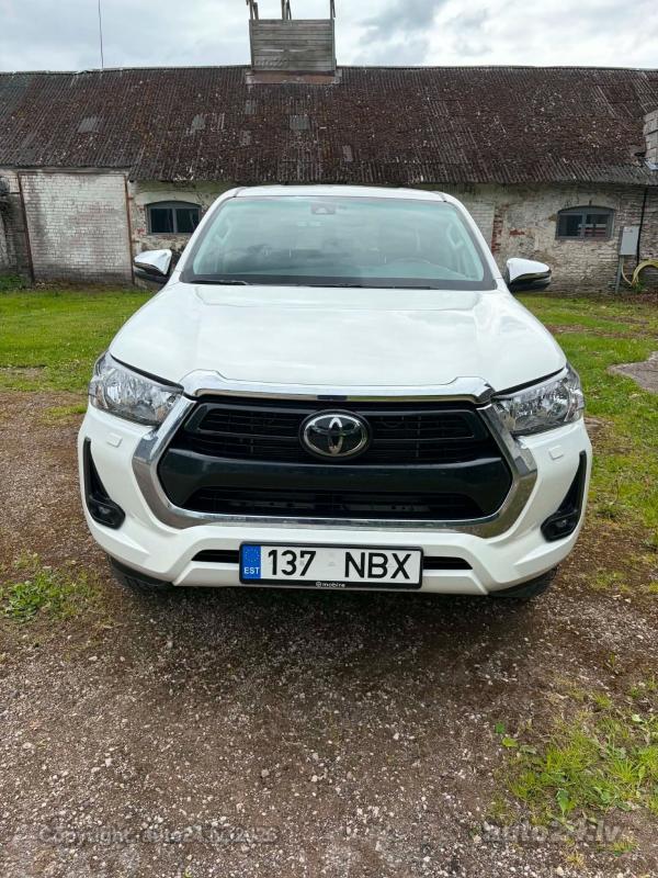 White Toyota Hilux 2024 in Tallinn, with an engine capacity of 2.40 L and mileage of 60 thousand km for 44800 €, photo 5 on AUTOMOTO.COM.LV