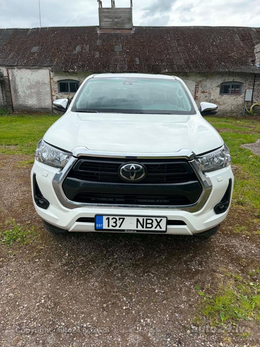 White Toyota Hilux 2024 in Tallinn, with an engine capacity of 2.40 L and mileage of 60 thousand km for 44800 €, photo 6 on AUTOMOTO.COM.LV