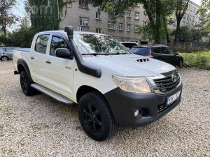 White Toyota Hilux 2014 in Riga, with an engine capacity of 2.50 L and mileage of 170 thousand km for 13100 €, photo 9 on AUTOMOTO.COM.LV
