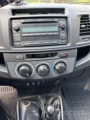 White Toyota Hilux 2014 in Riga, with an engine capacity of 2.50 L and mileage of 170 thousand km for 13100 €, photo 15 on AUTOMOTO.COM.LV