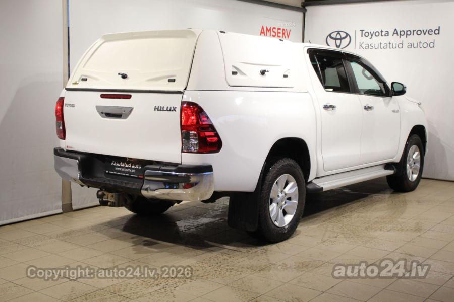 White Toyota Hilux 2018 in Tallinn, with an engine capacity of 2.40 L and mileage of 215 thousand km for 24990 €, photo 3 on AUTOMOTO.COM.LV