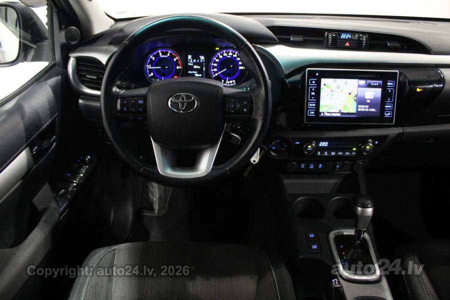 White Toyota Hilux 2018 in Tallinn, with an engine capacity of 2.40 L and mileage of 215 thousand km for 24990 €, photo 10 on AUTOMOTO.COM.LV