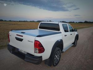 White Toyota Hilux 2021 in Birzai, with an engine capacity of 2.39 L and mileage of 173 thousand km for 28500 €, photo 6 on AUTOMOTO.COM.LV