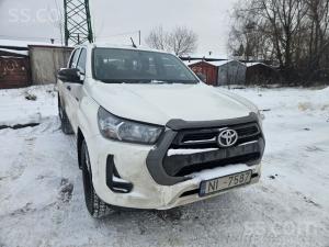 Balts Toyota Hilux 2022 Rīga, ar dzinēja tilpumu 2.40 L un nobraukumu 154 tūkst. km par 24000 €, foto  vietnē AUTOMOTO.COM.LV