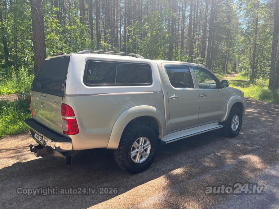 Dzeltens Toyota Hilux 2012 Tallina, ar dzinēja tilpumu 2.50 L un nobraukumu 323 tūkst. km par 14400 €, foto 3 vietnē AUTOMOTO.COM.LV