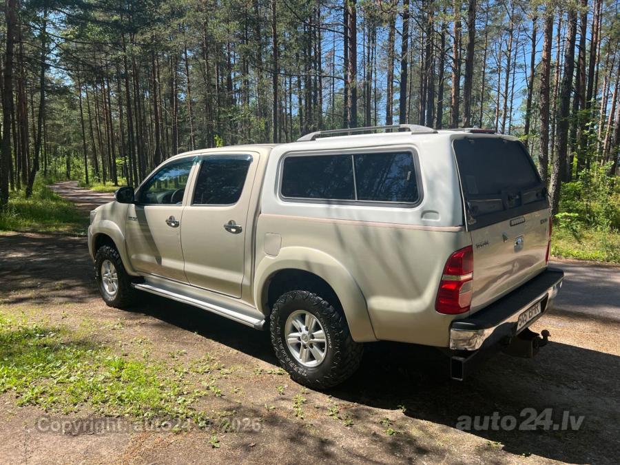 Dzeltens Toyota Hilux 2012 Tallina, ar dzinēja tilpumu 2.50 L un nobraukumu 323 tūkst. km par 14400 €, foto 5 vietnē AUTOMOTO.COM.LV