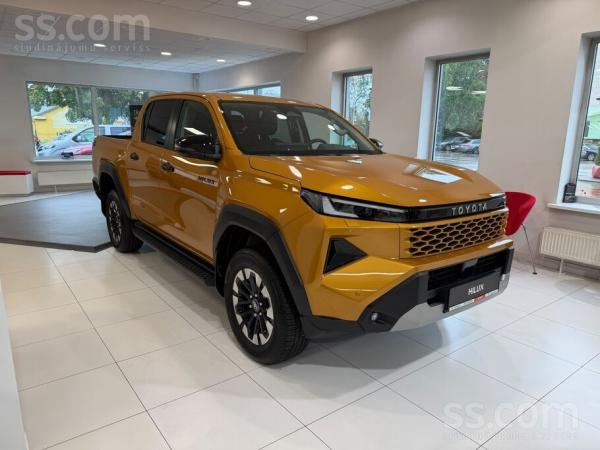 Yellow Toyota Hilux 2026 in Jekabpils, with an engine capacity of 2.80 L and mileage of 0 thousand km for 52690 €, photo 10 on AUTOMOTO.COM.LV