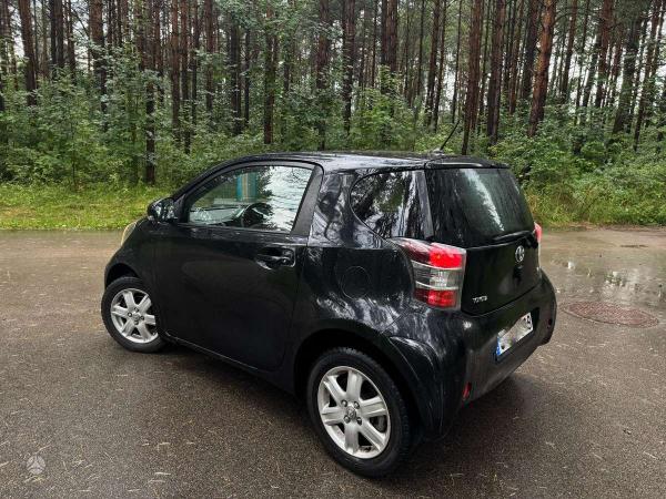 Melns Toyota IQ 2009 Viļņa, ar dzinēja tilpumu 1.00 L un nobraukumu 104 tūkst. km par 3350 €, foto 7 vietnē AUTOMOTO.COM.LV