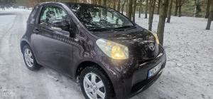 Violet Toyota IQ 2009 in Kaunas, with an engine capacity of 1.00 L and mileage of 235 thousand km for 4700 €, photo 3 on AUTOMOTO.COM.LV
