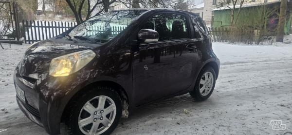 Violets Toyota IQ 2009 Kauņa, ar dzinēja tilpumu 1.00 L un nobraukumu 237 tūkst. km par 4650 €, foto 2 vietnē AUTOMOTO.COM.LV