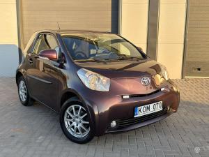 Violet Toyota IQ 2009 in Vilnius, with an engine capacity of 1.00 L and mileage of 167 thousand km for 2950 €, photo  on AUTOMOTO.COM.LV