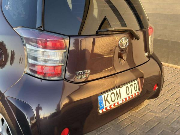 Violet Toyota IQ 2009 in Vilnius, with an engine capacity of 1.00 L and mileage of 167 thousand km for 2950 €, photo 6 on AUTOMOTO.COM.LV