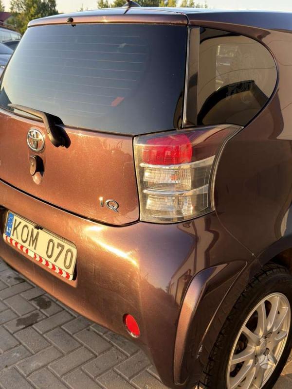 Violet Toyota IQ 2009 in Vilnius, with an engine capacity of 1.00 L and mileage of 167 thousand km for 2950 €, photo 8 on AUTOMOTO.COM.LV