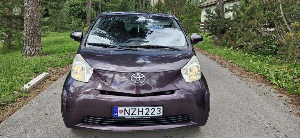 Violet Toyota IQ 2010 in Kaunas, with an engine capacity of 1.00 L and mileage of 264 thousand km for 3999 €, photo 2 on AUTOMOTO.COM.LV