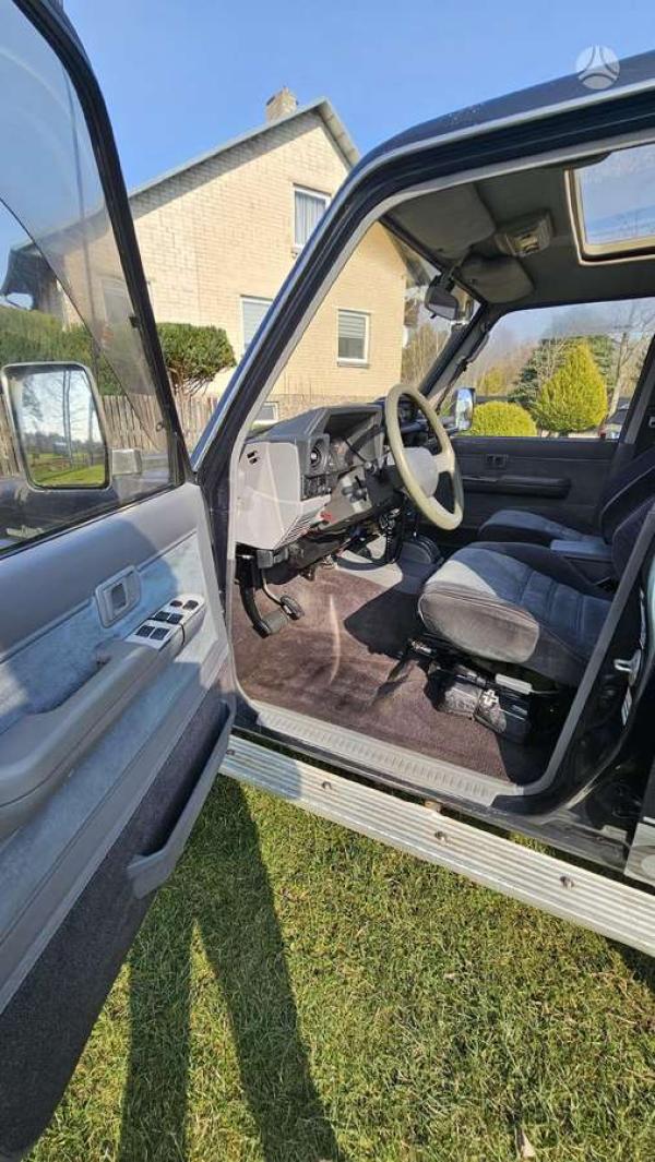 Black Toyota Land Cruiser 1993 in Palanga, with an engine capacity of 3.00 L and mileage of 184 thousand km for 18000 €, photo 11 on AUTOMOTO.COM.LV