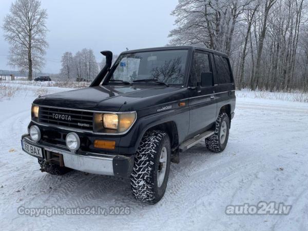 Black Toyota Land Cruiser 1994 in Tallinn, with an engine capacity of 2.40 L and mileage of 232 thousand km for 13900 €, photo 3 on AUTOMOTO.COM.LV