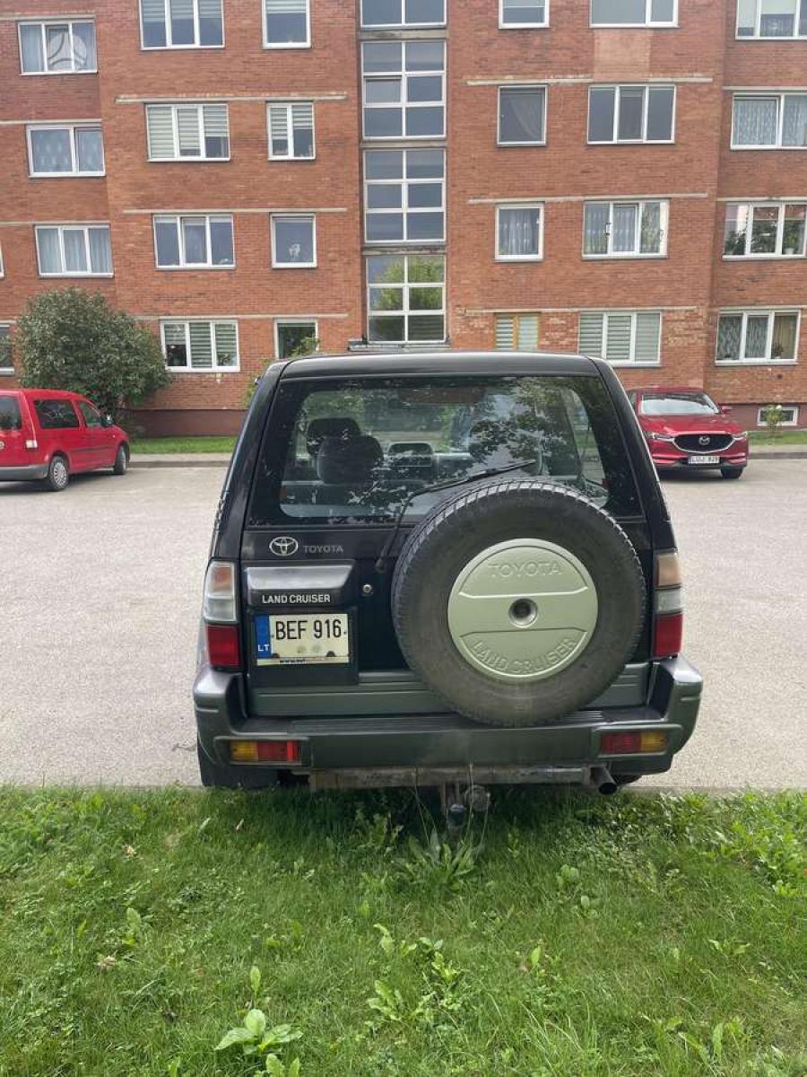 Melns Toyota Land Cruiser 1999 Ukmergė, ar dzinēja tilpumu 2.98 L un nobraukumu 261 tūkst. km par 3500 €, foto 1 vietnē AUTOMOTO.COM.LV