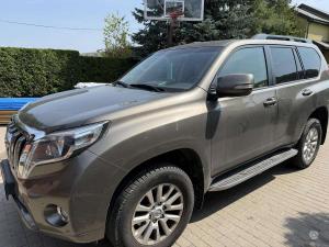 Brown Toyota Land Cruiser 2014 in Marijampole, with an engine capacity of 2.98 L and mileage of 201 thousand km for 24600 €, photo  on AUTOMOTO.COM.LV