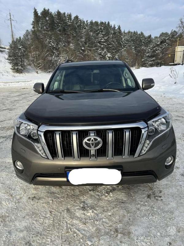Brown Toyota Land Cruiser 2015 in Vilnius, with an engine capacity of 2.76 L and mileage of 396 thousand km for 25700 €, photo 1 on AUTOMOTO.COM.LV