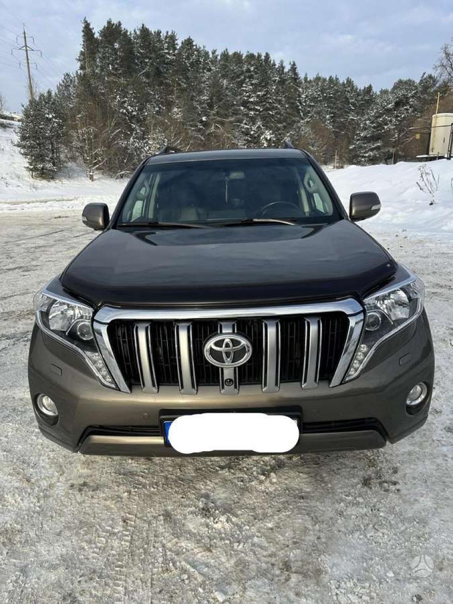 Brūns Toyota Land Cruiser 2015 Viļņa, ar dzinēja tilpumu 2.76 L un nobraukumu 396 tūkst. km par 25700 €, foto 1 vietnē AUTOMOTO.COM.LV