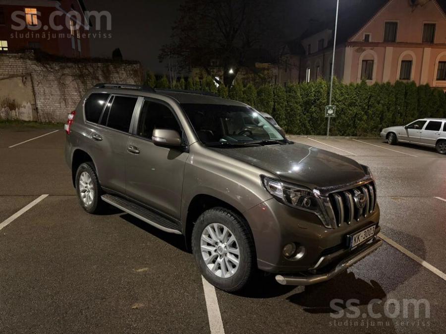 Brown Toyota Land Cruiser 2016 in Madona, with an engine capacity of 2.80 L and mileage of 260 thousand km for 31460 €, photo 1 on AUTOMOTO.COM.LV