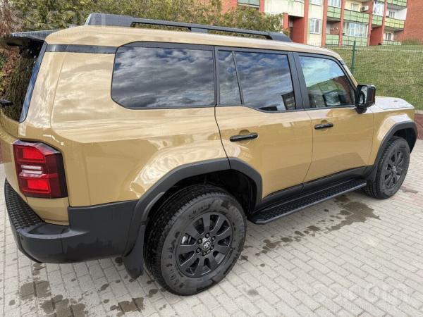 Brown Toyota Land Cruiser 2024 in Jekabpils, with an engine capacity of 2.80 L and mileage of 15 thousand km for 75500 €, photo 4 on AUTOMOTO.COM.LV