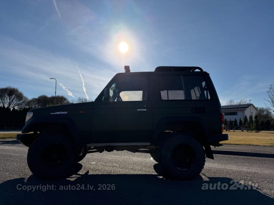 Green Toyota Land Cruiser 1995 in Tallinn, with an engine capacity of 3.00 L and mileage of 326 thousand km for 11999 €, photo 14 on AUTOMOTO.COM.LV