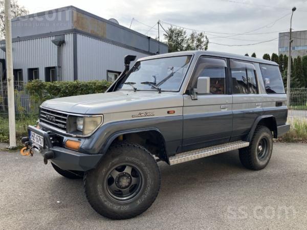 Toyota Land Cruiser 1990 in Riga on AUTOMOTO.COM.LV Grey Toyota Land Cruiser 1990 in Riga, with an engine capacity of 2.40 L and mileage of 256 thousand km for 16500 €, photo 1 on AUTOMOTO.COM.LV