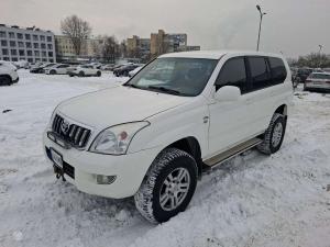 Balts Toyota Land Cruiser Prado 2009 Viļņa, ar dzinēja tilpumu 3.00 L un nobraukumu 300 tūkst. km par 9400 €, foto  vietnē AUTOMOTO.COM.LV