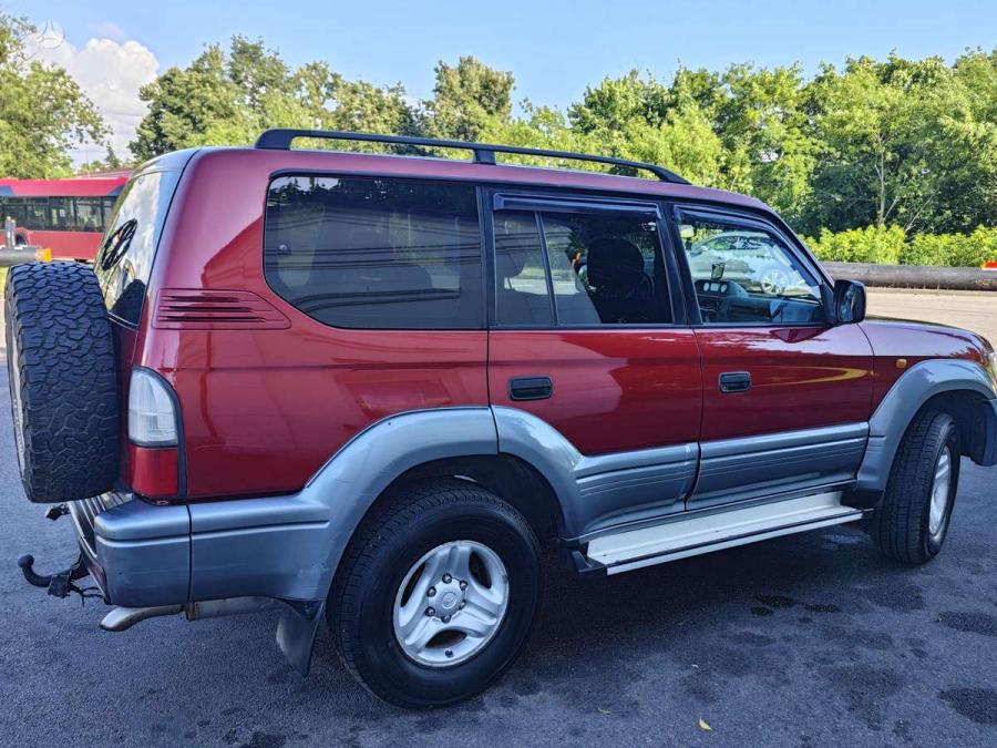 Sarkans Toyota Land Cruiser 2002 Viļņa, ar dzinēja tilpumu 3.00 L un nobraukumu 400 tūkst. km par 7500 €, foto 6 vietnē AUTOMOTO.COM.LV