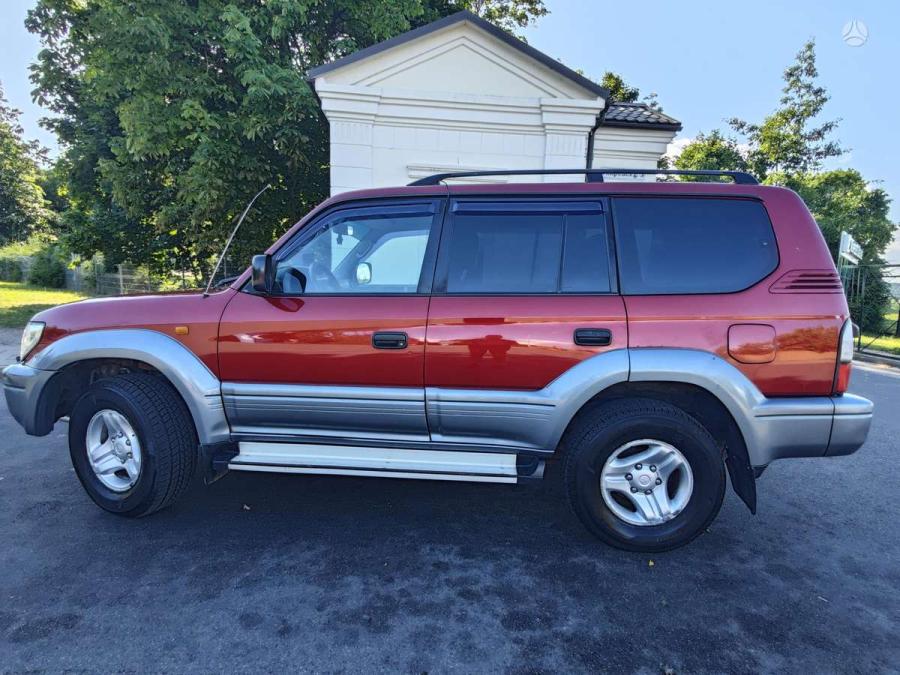 Sarkans Toyota Land Cruiser 2002 Viļņa, ar dzinēja tilpumu 3.00 L un nobraukumu 400 tūkst. km par 7500 €, foto 10 vietnē AUTOMOTO.COM.LV