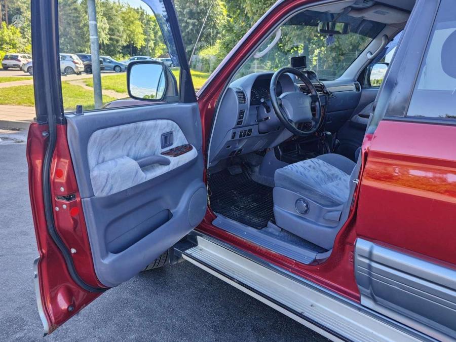 Sarkans Toyota Land Cruiser 2002 Viļņa, ar dzinēja tilpumu 3.00 L un nobraukumu 400 tūkst. km par 7500 €, foto 14 vietnē AUTOMOTO.COM.LV