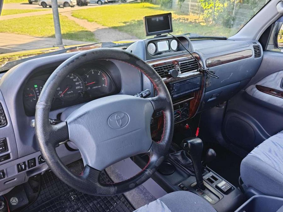 Sarkans Toyota Land Cruiser 2002 Viļņa, ar dzinēja tilpumu 3.00 L un nobraukumu 400 tūkst. km par 7500 €, foto 15 vietnē AUTOMOTO.COM.LV