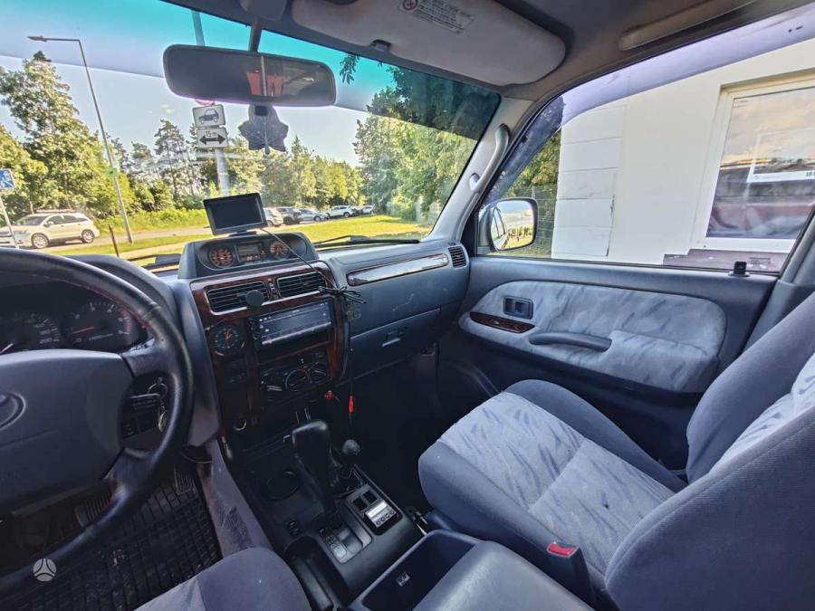 Sarkans Toyota Land Cruiser 2002 Viļņa, ar dzinēja tilpumu 3.00 L un nobraukumu 400 tūkst. km par 7500 €, foto 17 vietnē AUTOMOTO.COM.LV