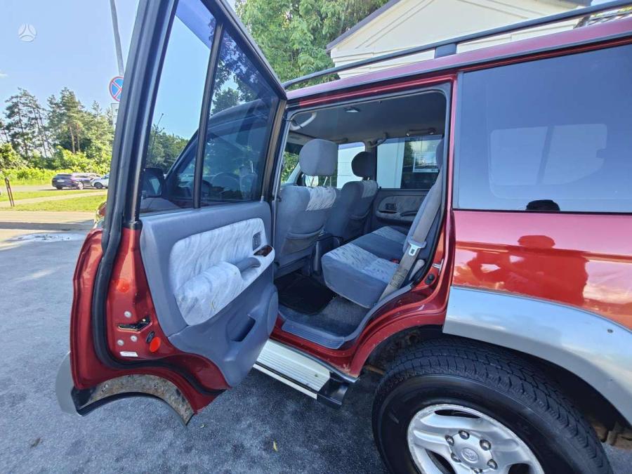 Sarkans Toyota Land Cruiser 2002 Viļņa, ar dzinēja tilpumu 3.00 L un nobraukumu 400 tūkst. km par 7500 €, foto 19 vietnē AUTOMOTO.COM.LV